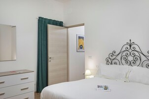 Apartamento | Ferros/tábuas de passar roupa, berços (sobretaxa), Wi-Fi de cortesia