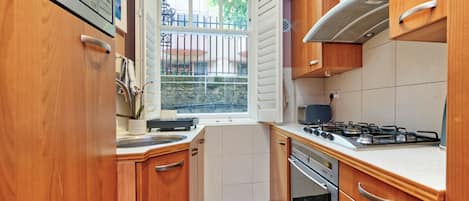 Apartamento (1 Bedroom) | Cozinha privada | Geladeira, micro-ondas, fogão, cooktop