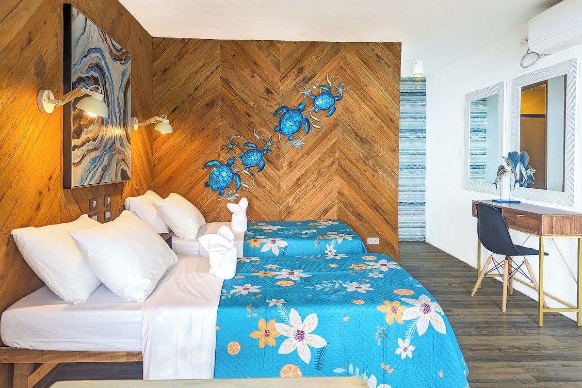 Quarto duplo superior, 2 camas de solteiro, para não fumantes, vista para o oceano | Wi-Fi de cortesia