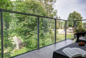 Apartamento conforto, vista para o parque | Terraço/pátio