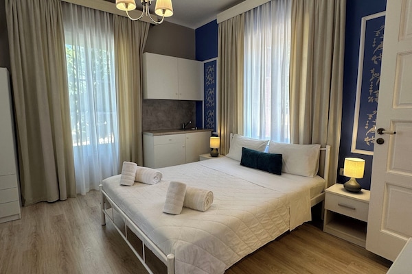 Quarto Duplo ou Twin Deluxe, 1 cama queen-size, cozinha, vista para o pátio | Lençóis de algodão egípcio, roupa de alta qualidade
