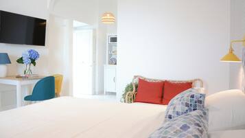 Quarto Panorâmico, vista para o mar | Minibar com produtos grátis, cofre no quarto