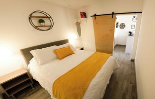 Casa, 2 quartos | Frigobar, Wi-Fi de cortesia, roupa de cama