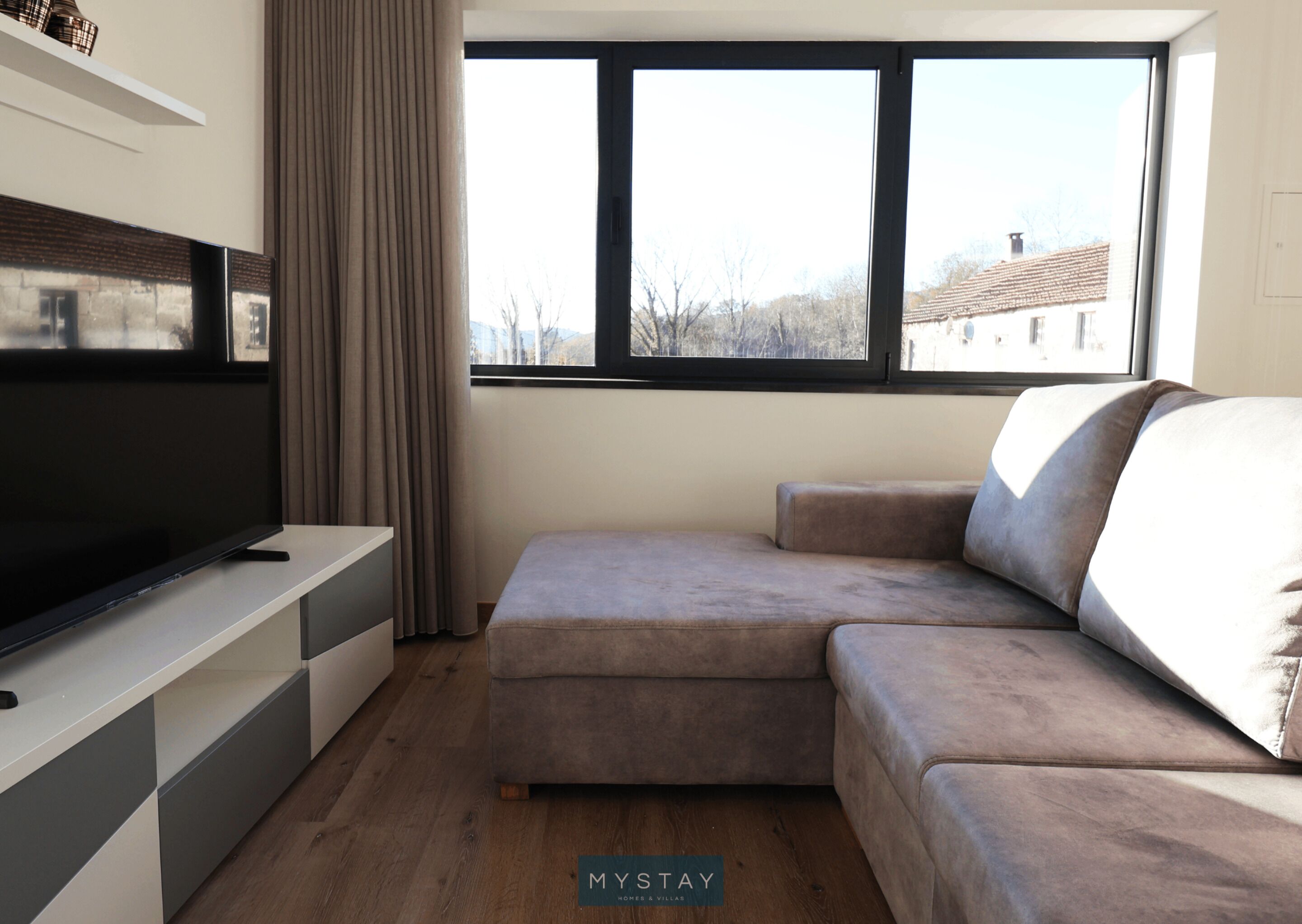 Apartamento Familiar | Sala de estar | Televisor de ecrã plano de 20 polegadas com canais por cabo 