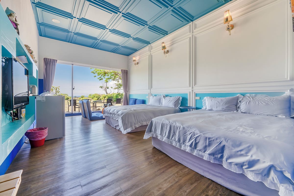Quarto quádruplo, sacada | Cortinas blackout, Wi-Fi de cortesia, roupa de cama