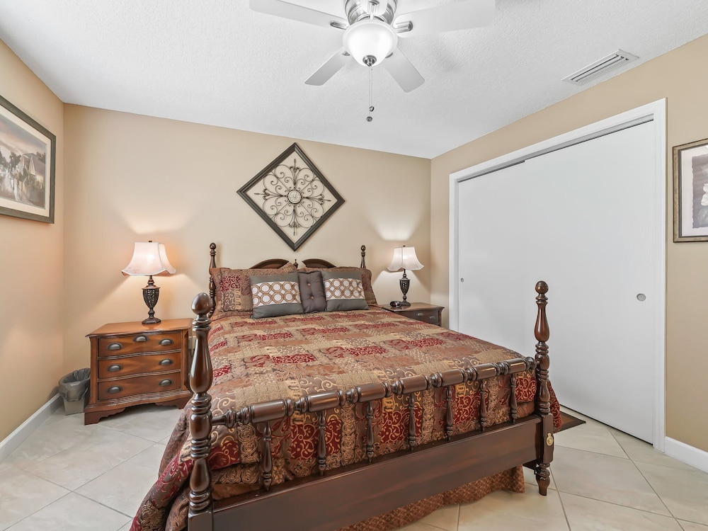 Discover Relaxation and Fun in a Charming Patio Villa with a Golf Cart ...