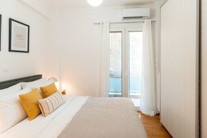 Apartamento superluxo, vista para a cidade | 1 quarto, cofres nos quartos, cortinas blackout, Wi-Fi de cortesia