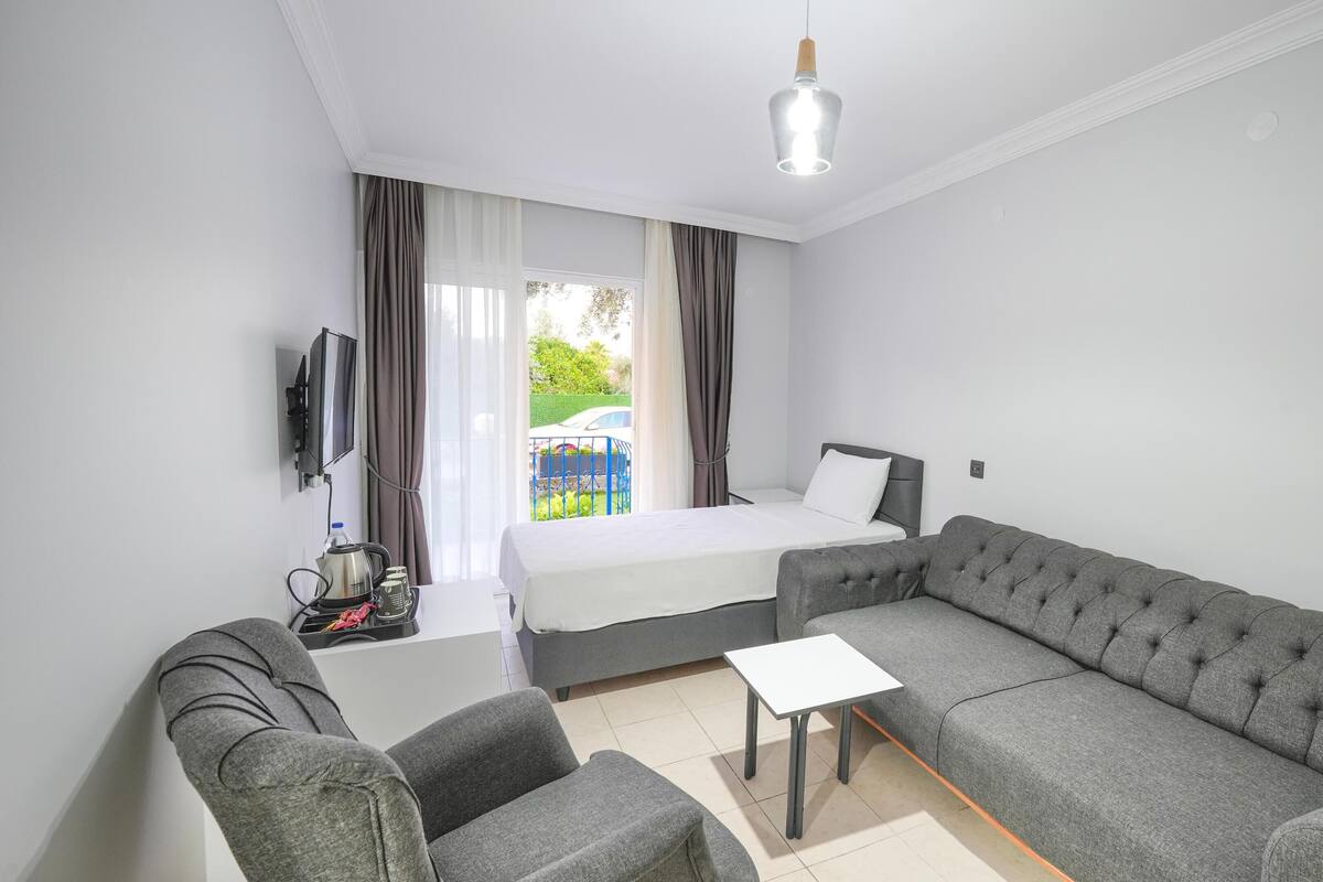 Quarto Familiar, várias camas, não fumadores, vista para o jardim | Roupa de alta qualidade, camas de colchão Select Comfort, minibar