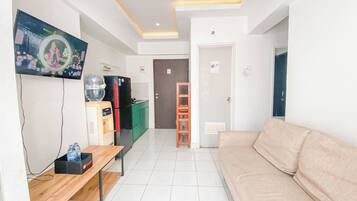 Apartamento Deluxe | Sala de estar