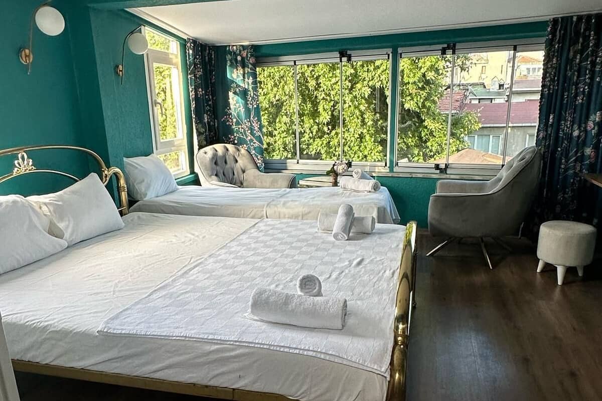 Quarto triplo luxo | Terraço/pátio