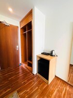 Quartos à prova de som, Wi-Fi de cortesia, roupa de cama