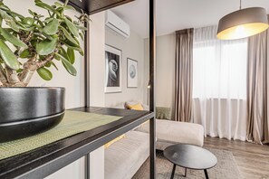 Apartamento Comfort, 1 quarto | Sala | Smart TV de 37 polegadas com canais digitais