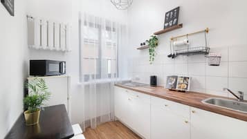 Apartamento Comfort, Vista para a cidade | Cozinha privada