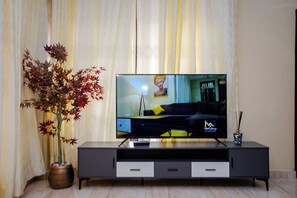 Apartamento de Luxo | Sala de estar | TV de ecrã plano, Netflix, serviços de streaming 