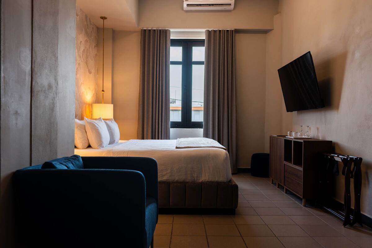 Quarto luxo | 1 quarto, roupas de cama premium, cortinas blackout