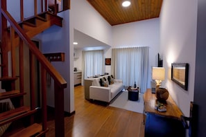 Apartamento conforto, vista para a montanha | Área de estar