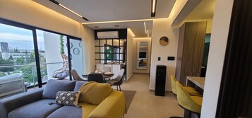 Apartamento Exclusivo | Sala de estar | TV de ecrã plano 