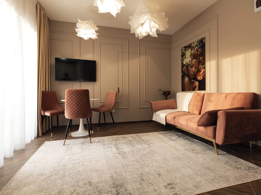 Apartamento Deluxe, varanda | Sala de estar | TV de ecrã plano