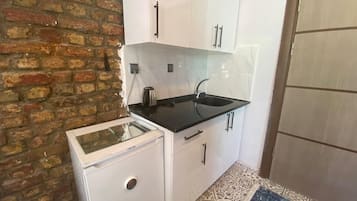 Suite-Estúdio Comfort, Vista para a cidade | Quartos insonorizados, ferro/tábua de engomar, Wi-fi grátis