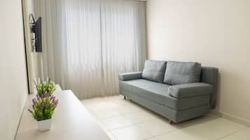 Apartamento | Sala de estar | Televisor