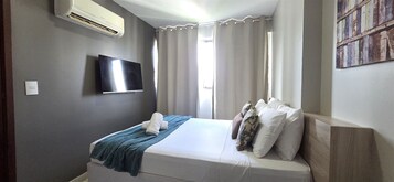 Apartamento | Secretária, Wi-fi grátis 