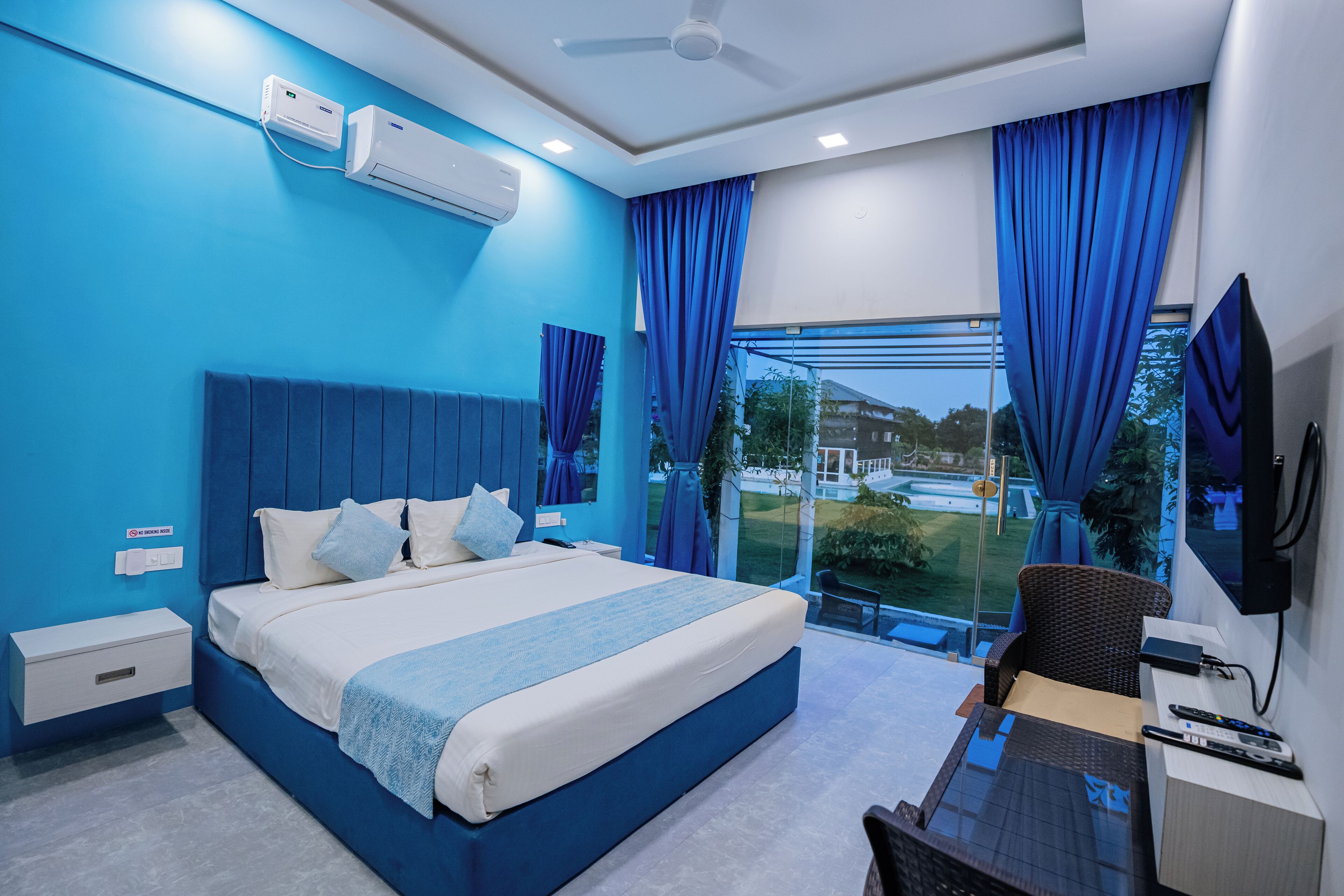 Quarto executivo | Roupas de cama premium, camas Select Comfort, Wi-Fi de cortesia