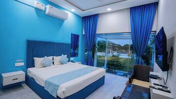 Quarto executivo | Roupas de cama premium, camas Select Comfort, Wi-Fi de cortesia