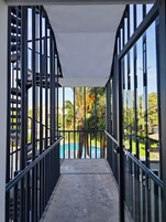 Quarto Triplo, vista para a piscina | Sala de estar | Monitores, impressoras 