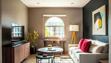 Apartamento família | Área de estar | Smart TV 32 polegadas com canais digitais