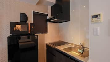 Quarto Quádruplo Superior | Cozinha privada | Um frigorífico, um micro-ondas, uma placa de cozinha