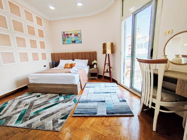 Apartamento Deluxe | 3 quartos, minibar, com decoração personalizada 