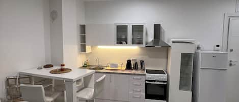 Apartamento de Luxo, Vista para a cidade | Sala de estar | Televisor de ecrã plano de 40 polegadas com canais por cabo