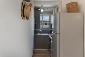 Apartamento de Luxo | 1 quarto, cofre no quarto, ferro/tábua de engomar, Wi-fi grátis