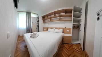 Apartamento Comfort, 2 quartos, cozinha, vista para o jardim | 2 quartos, lençóis de algodão egípcio, roupa de alta qualidade