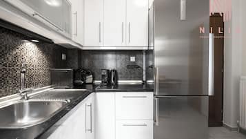 Apartamento, varanda, Vista para a cidade | Cozinha privada