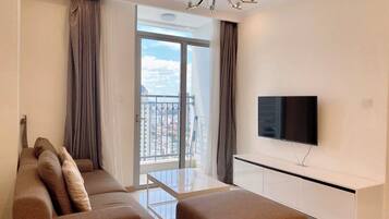 Apartamento de Luxo, varanda, Vista para a cidade | Sala de estar | Televisor LCD