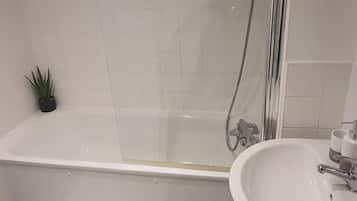 Chuveiro/banheira combinados, banheira de imersão, toalhas de banho