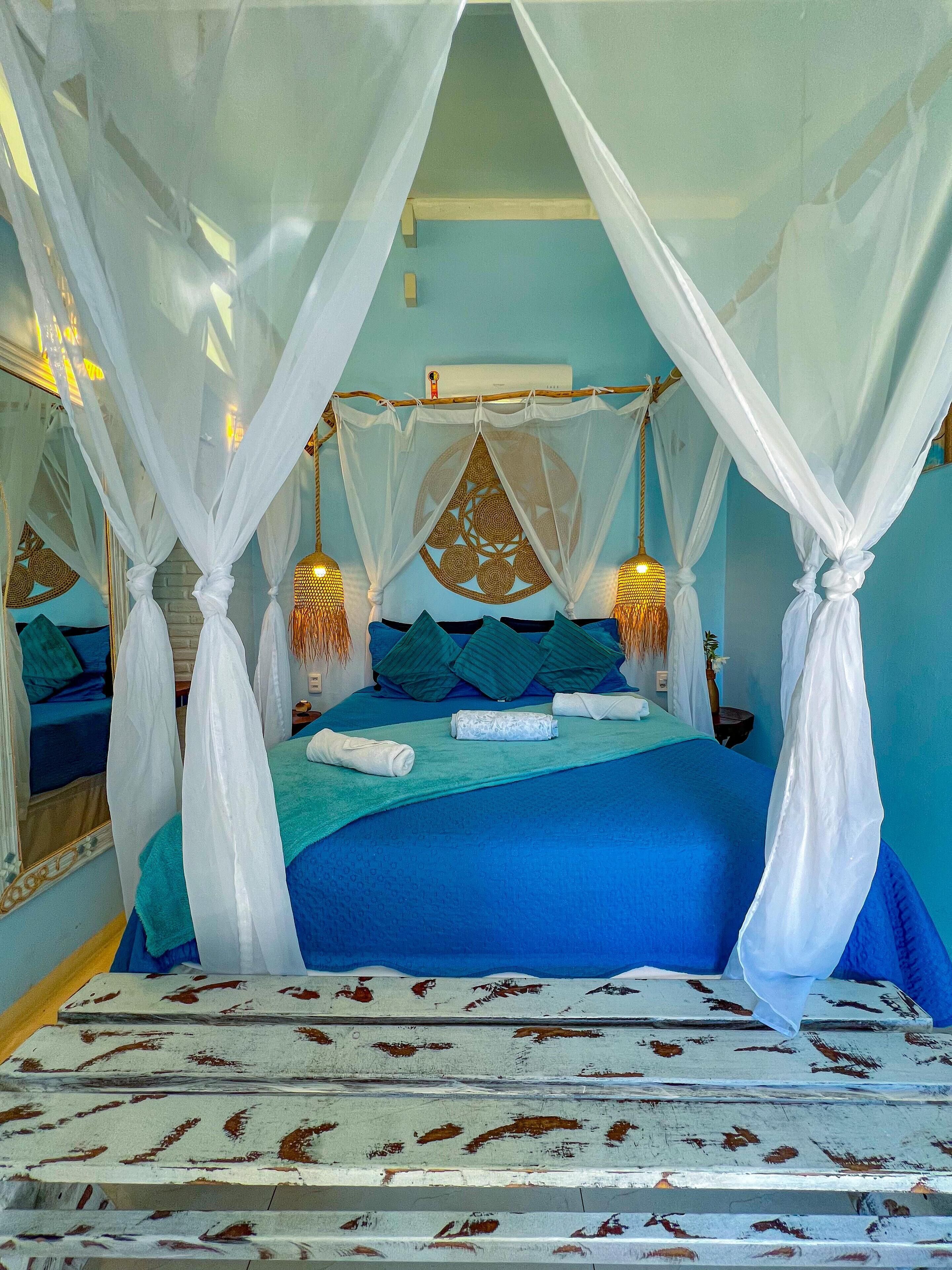 Suite Deluxe, vista para o mar | 1 quarto, cofre no quarto, com decoração personalizada, Wi-fi grátis 