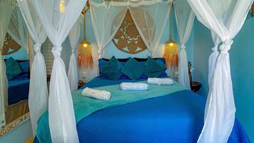 Suite Deluxe, vista para o mar | 1 quarto, cofre no quarto, com decoração personalizada, Wi-fi grátis