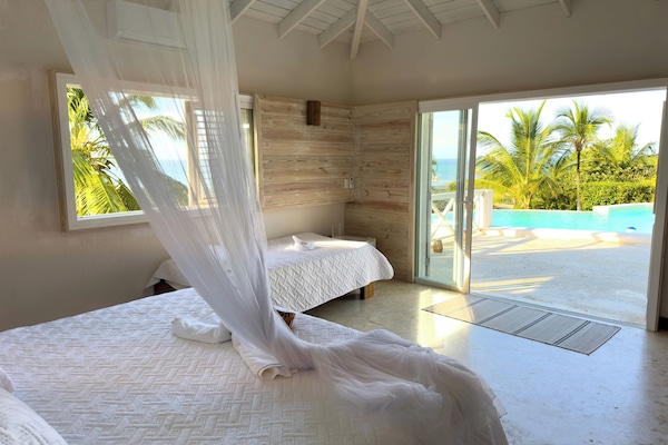 Quarto Júnior, vista para o mar | Minibar, cofre com capacidade para portátil, Wi-fi grátis