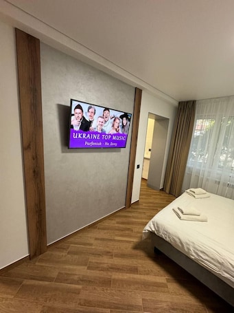 Apartamento BÔsico | Sala de estar | TV de ecrã plano