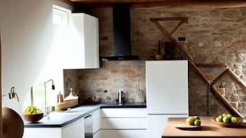 Quarto Duplo Comfort, varanda, vista para o jardim | Cozinha privada