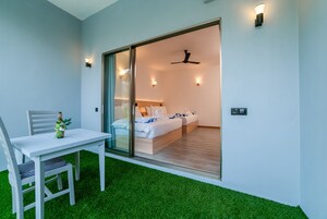 Quarto casal luxo, varanda, vista para o jardim | Terraço/pátio