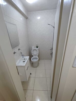 Quarto Comfort | Minibar, roupa de cama fornecida