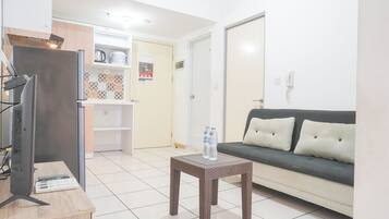 Apartamento Deluxe | Sala de estar