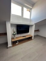 Apartamento família, vista para o jardim | Roupas de cama premium, individualmente decorados