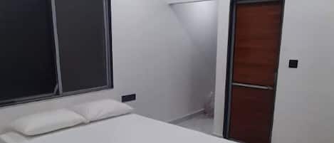 Quarto luxo, vista para a cidade