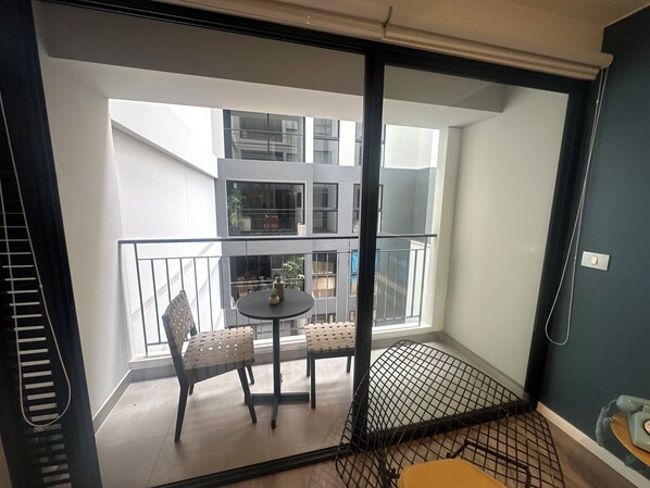 Apartamento Empresarial, varanda | Sala de estar