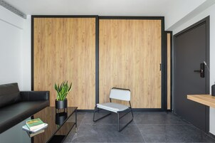 Suite Superior | Cofre com capacidade para portátil, cortinas/cortinados opacos 