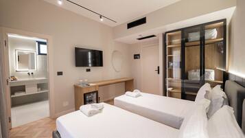 Frigobar, escrivaninha, quartos Ă prova de som, Wi-Fi de cortesia